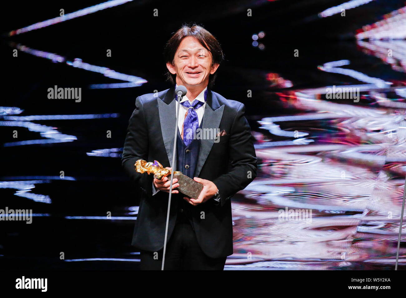 **TAIWAN OUT**Japanese action director poses with his trophy of the ...