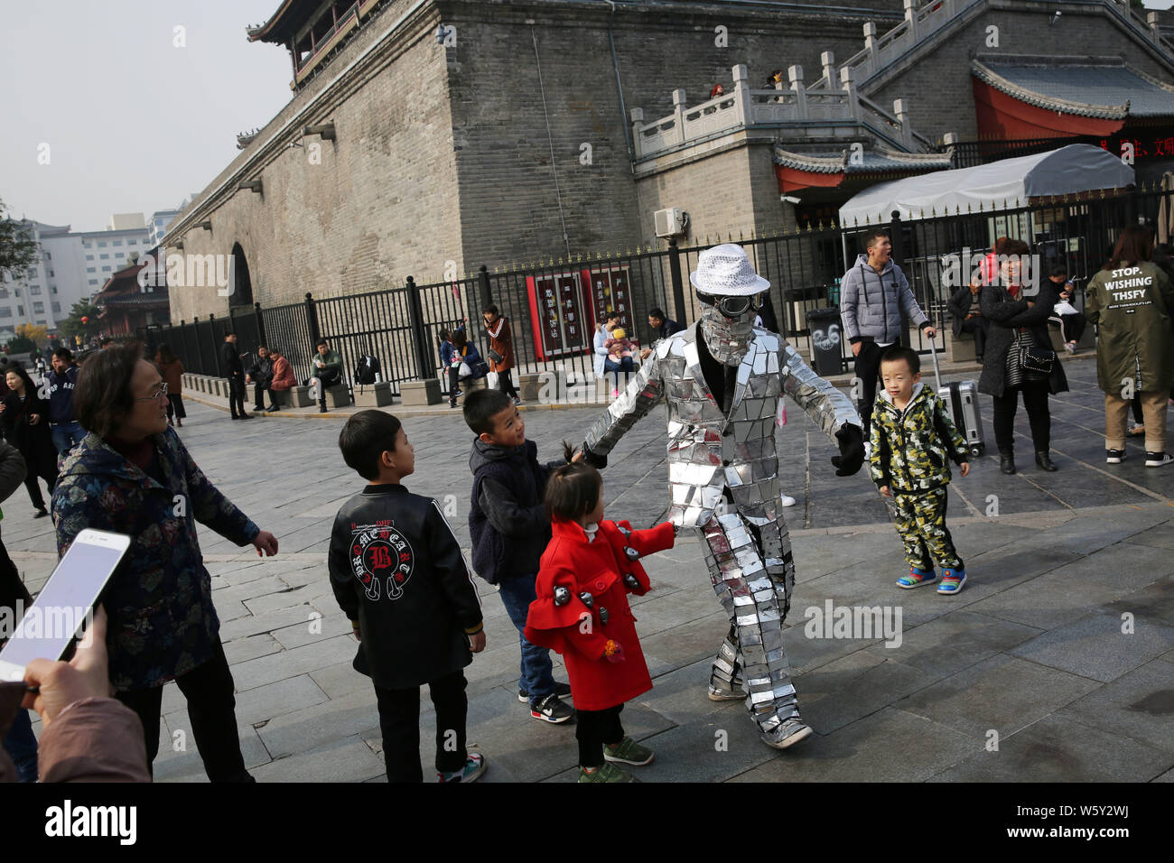 22-year-old Chinese boy Li Qiuxun perform dancing as he imitates ...