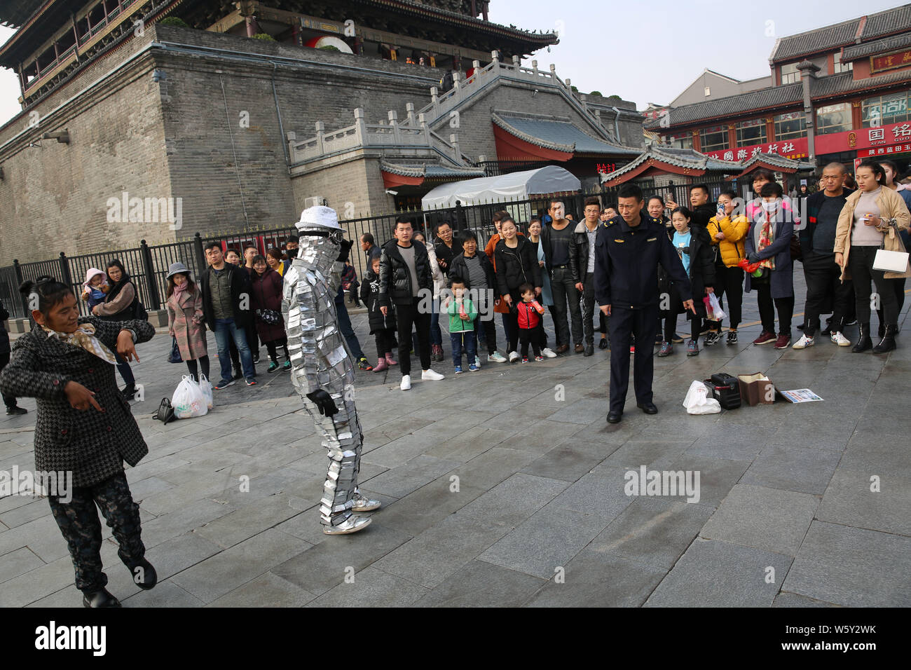22-year-old Chinese boy Li Qiuxun perform dancing as he imitates ...