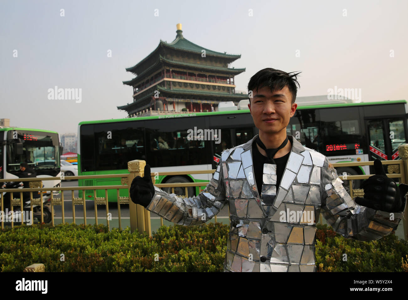 22-year-old Chinese boy Li Qiuxun perform dancing as he imitates ...