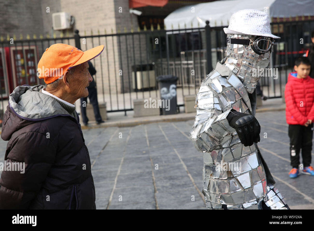 22-year-old Chinese boy Li Qiuxun perform dancing as he imitates ...