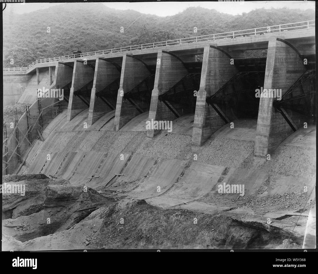 Stewart Mountain Dam. View showing chipping for revision of ogee ...