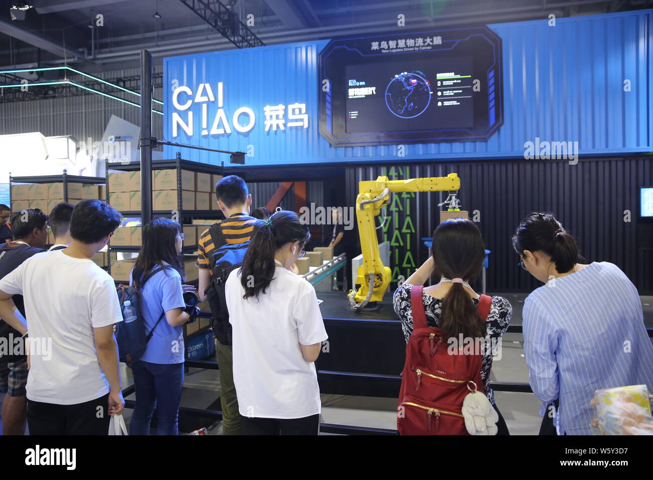 --FILE--People visit the stand of Cainiao Network, the logistics arm of ...