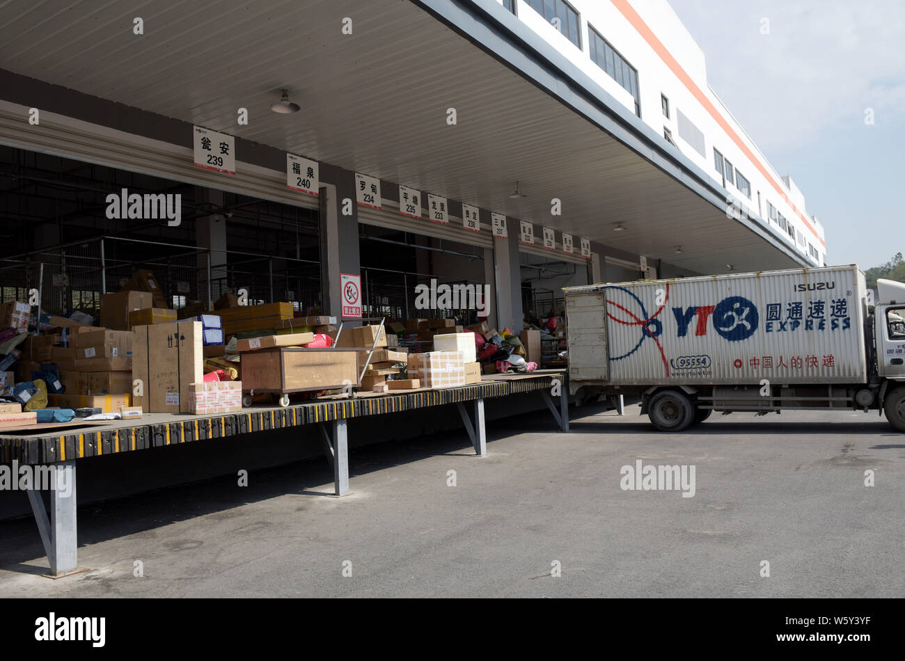--FILE--A delivery vehicle is parked at a distribution center of YTO ...