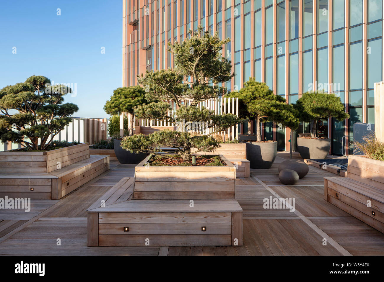Sky garden with planting and timber decking. The Stratford - Manhattan ...