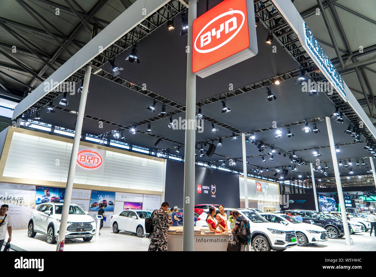 --FILE--People visit the stand of Chinese top electric carmaker BYD ...