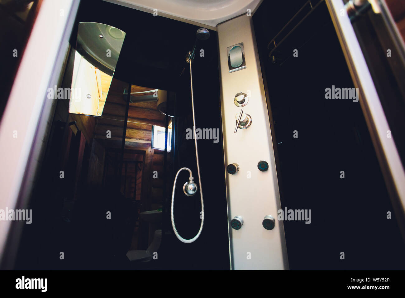 Modern and big shower cabin in bathroom corner Stock Photo - Alamy