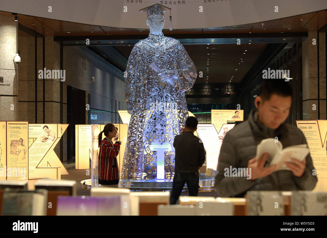 An art installation featuring the shape of a Ph.D graduate composed of ...