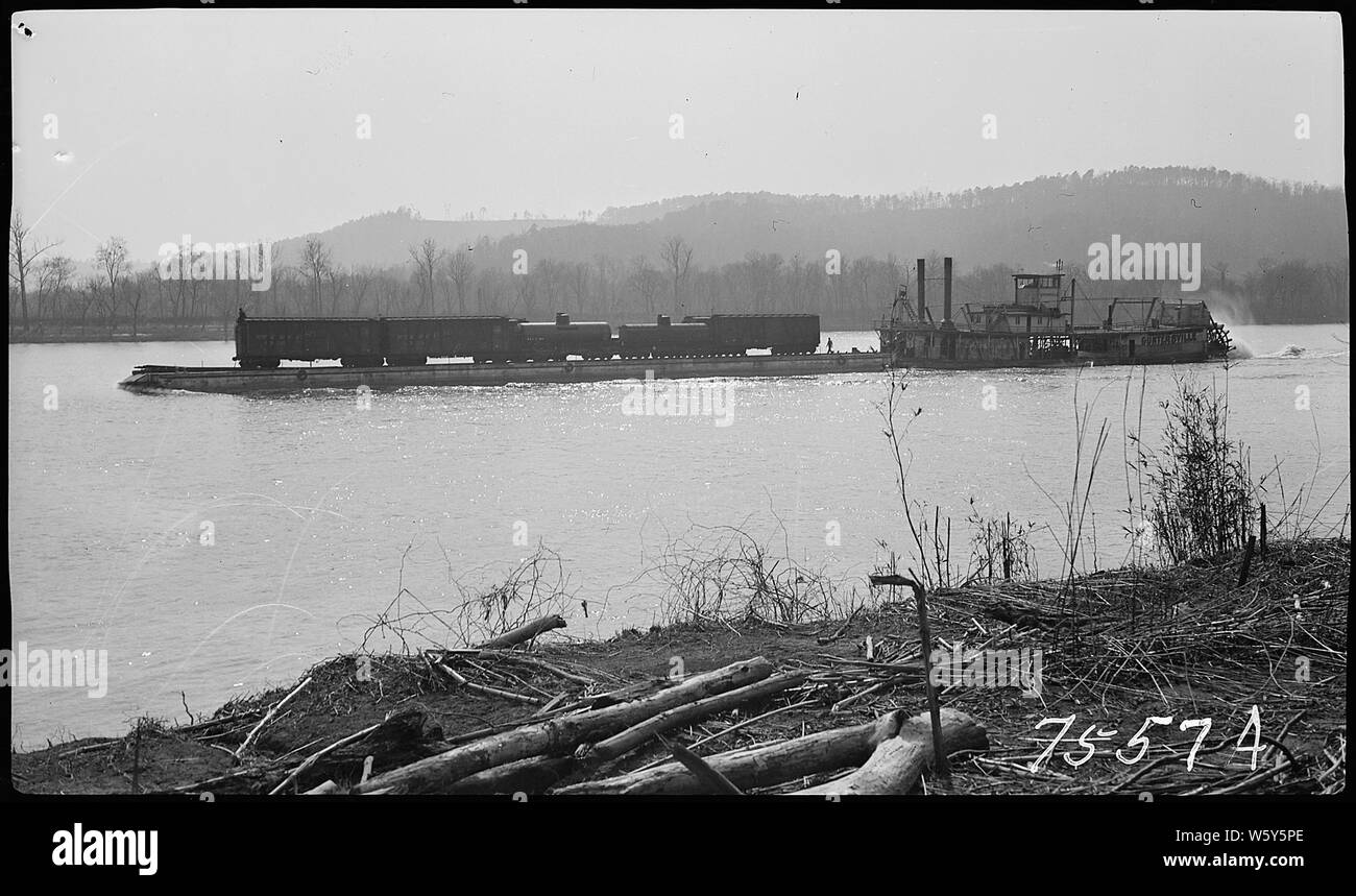 Sweep barge leaving commercial harbor Stock Photo - Alamy