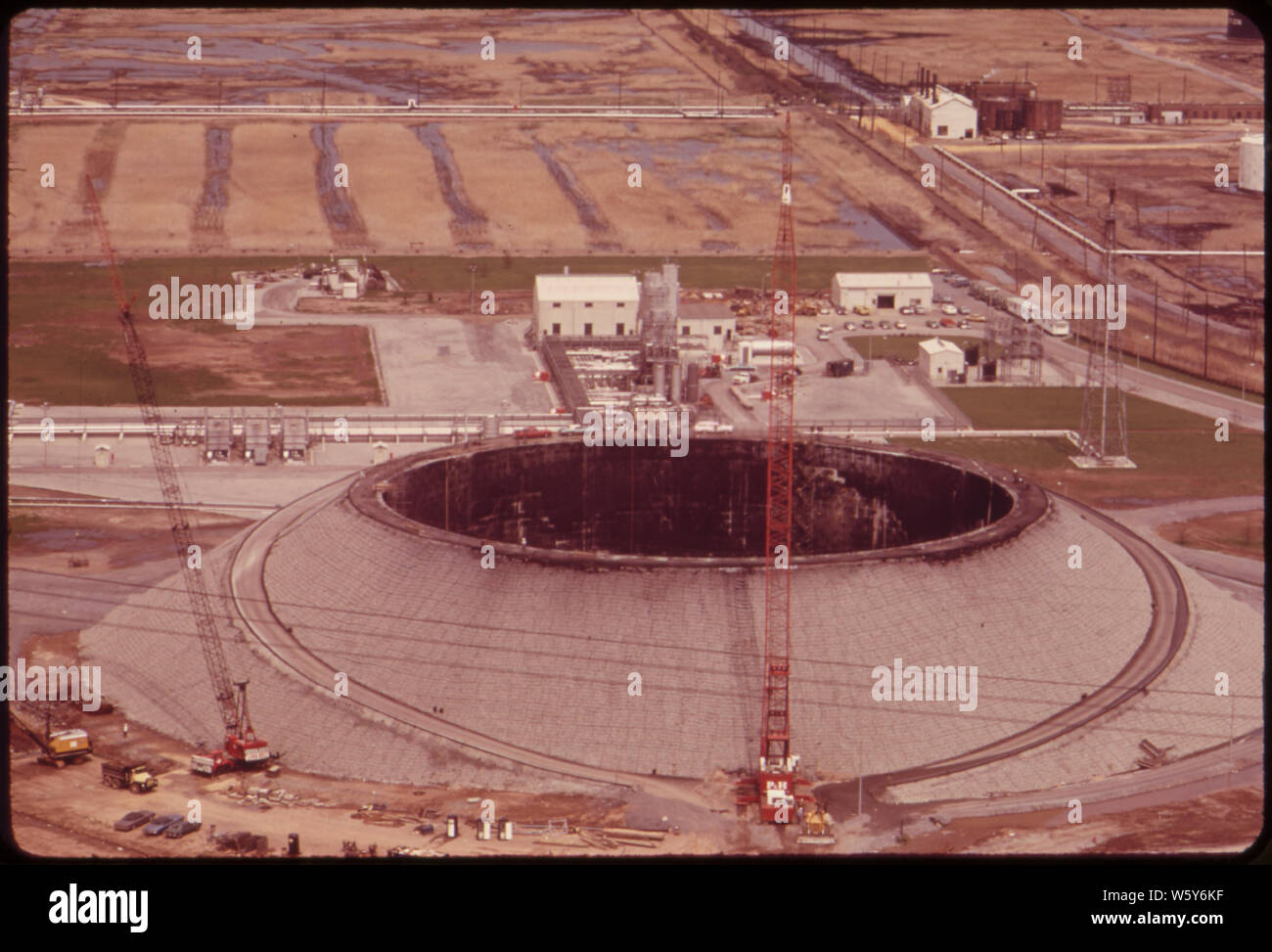 Imploded tank hi-res stock photography and images - Alamy