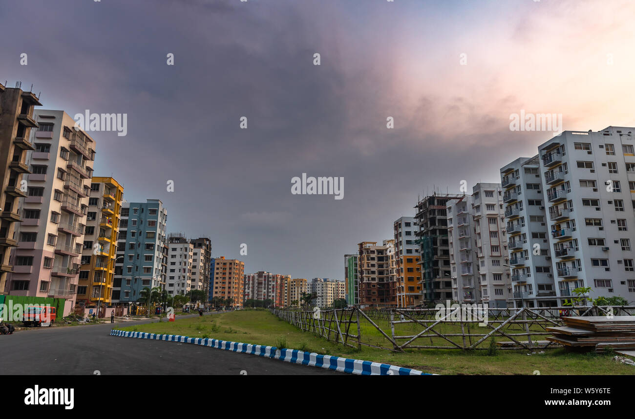 Colorful City residential building apartments with adjoining road at ...
