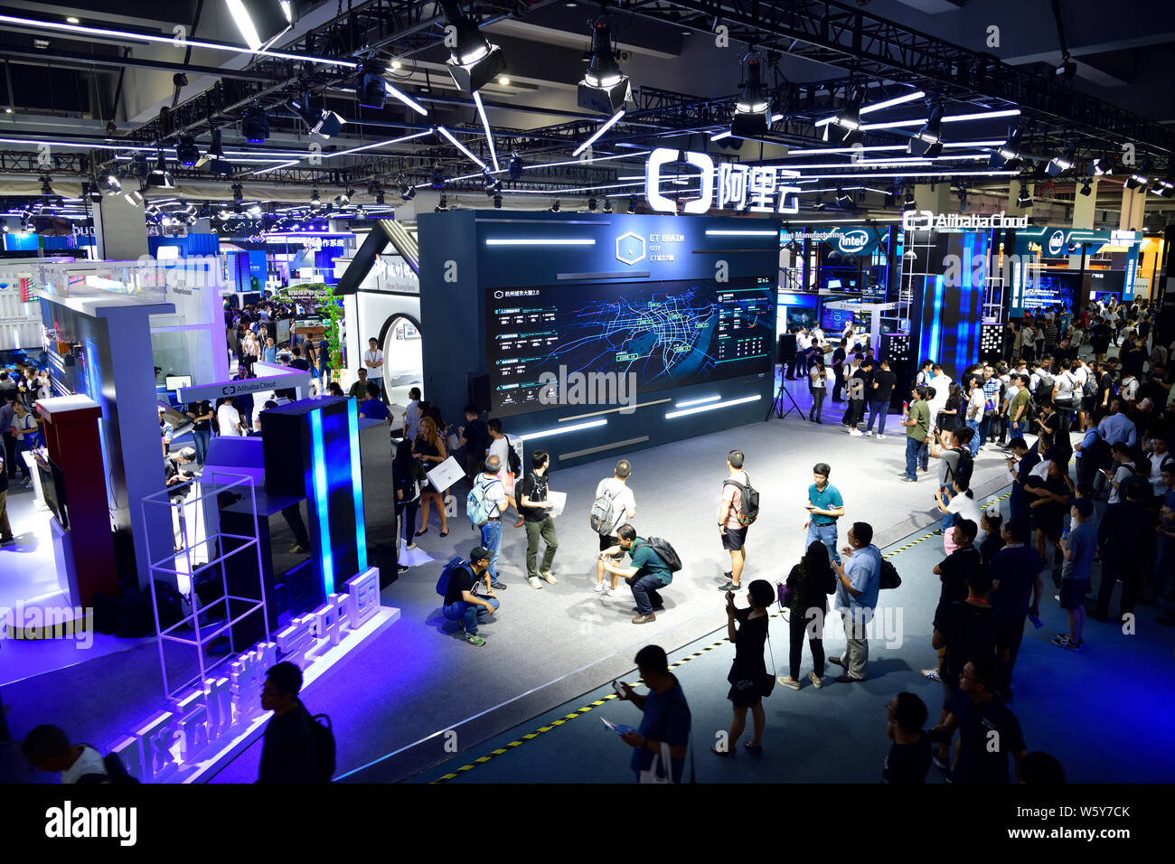 --FILE--People visit the stand of AliCloud, the cloud computing arm of ...