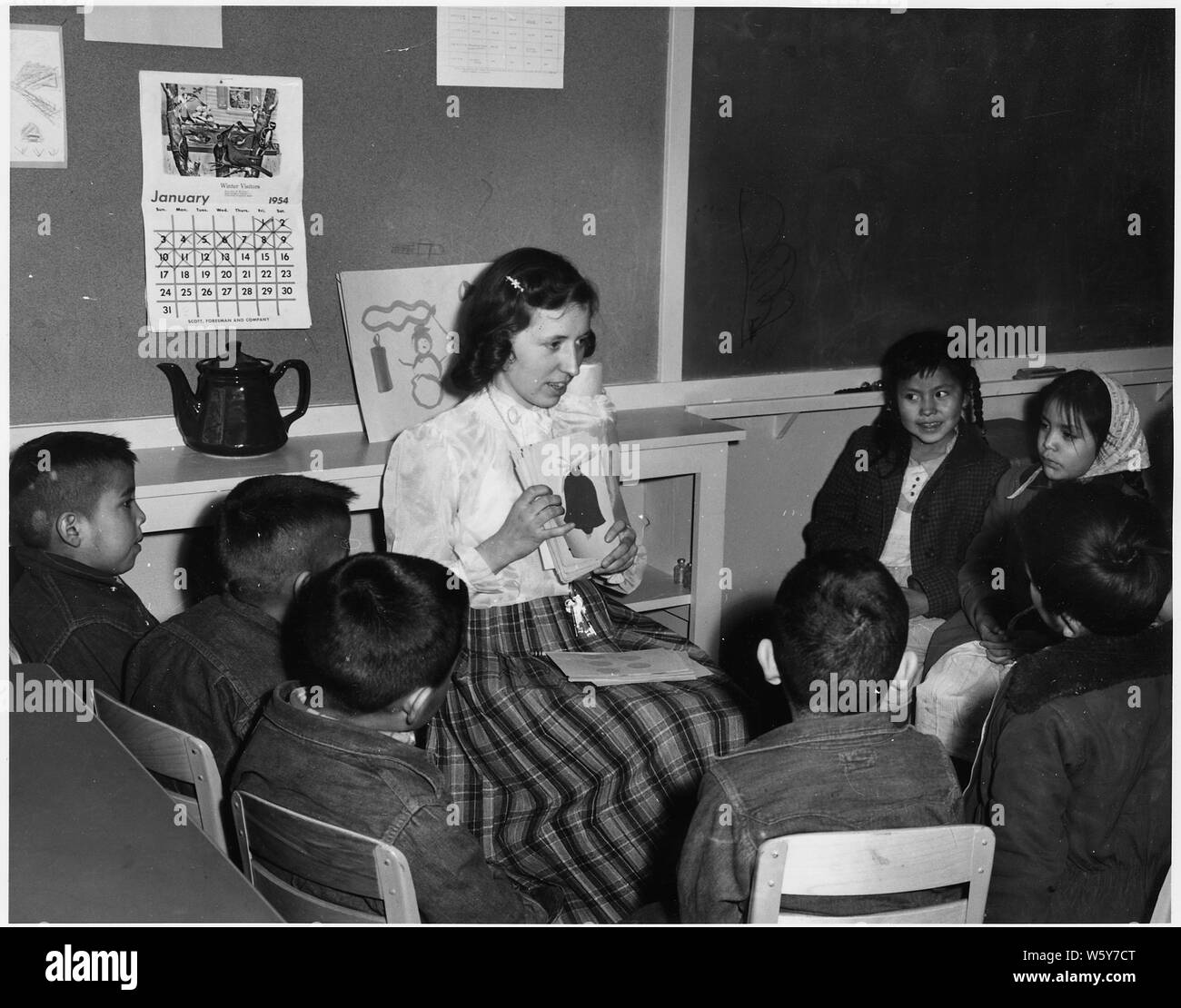 [Teacher with picture cards giving English instruction to Navajo day ...