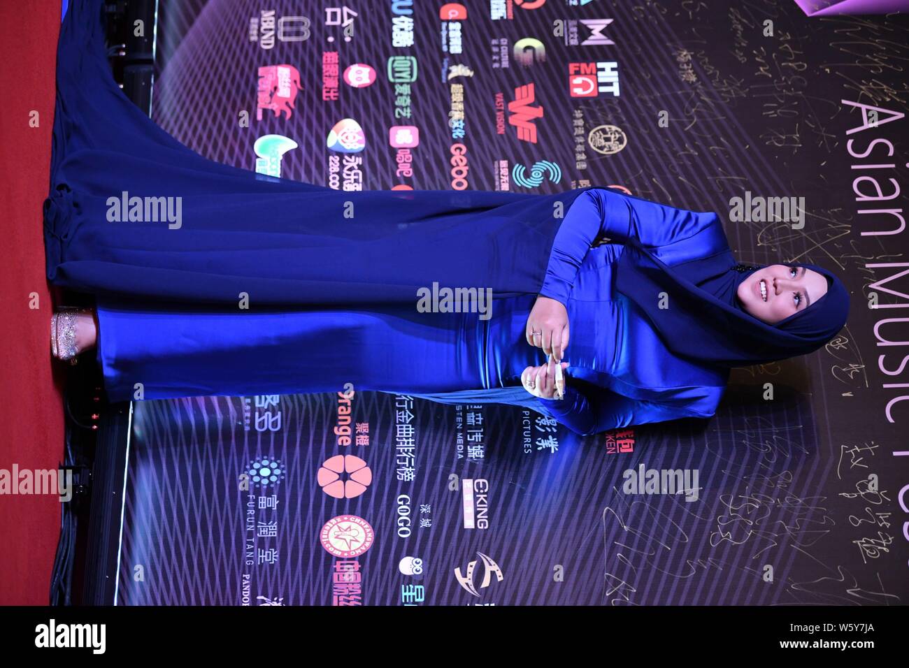 Malaysian singer-songwriter Shila Amzah poses as she arrives on the red ...