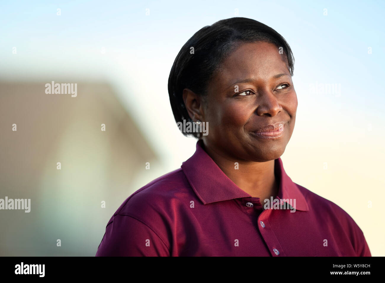 Contemplative female nurse Stock Photo - Alamy