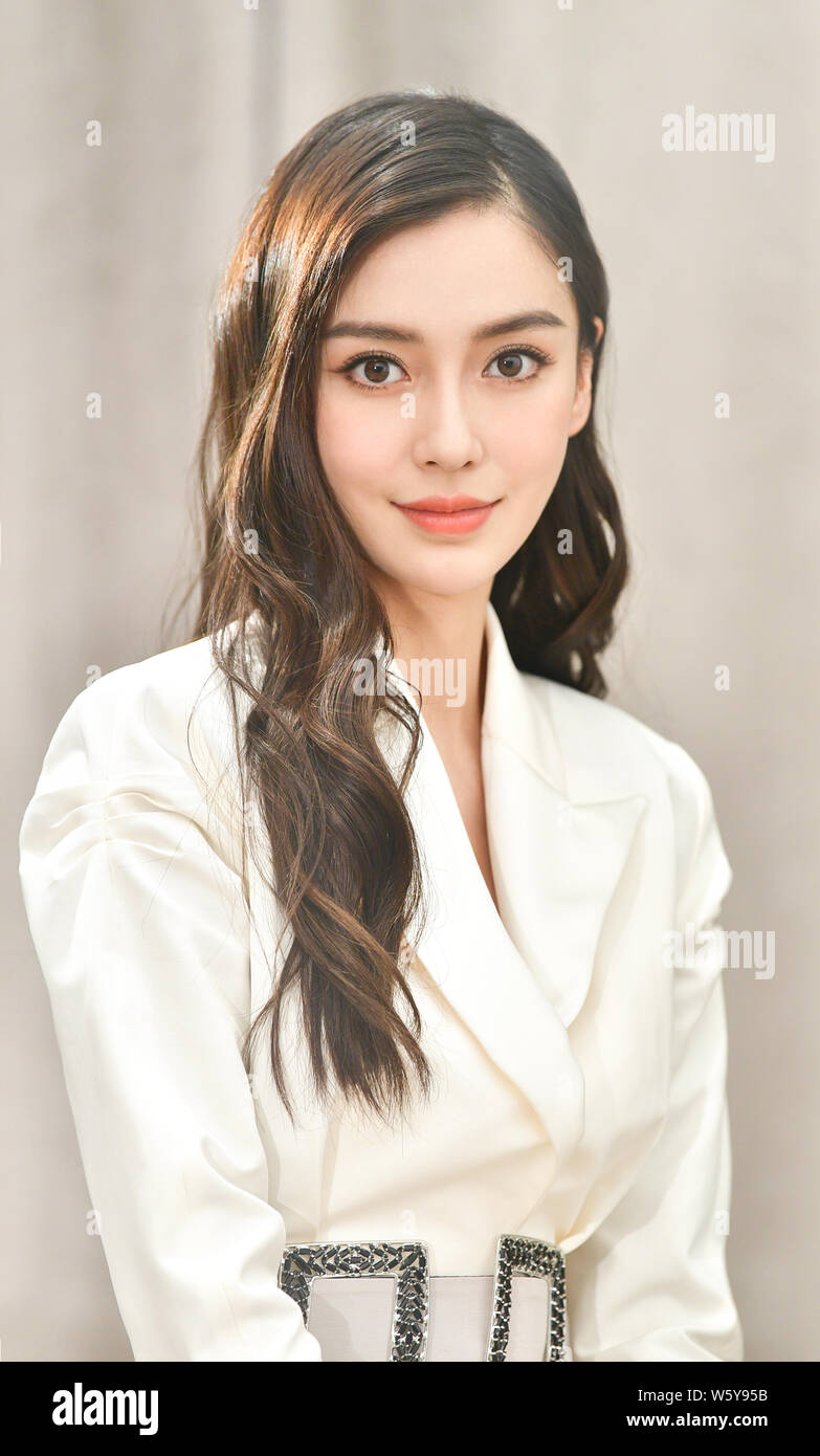 Hong Kong actress and model Angelababy poses for portrait photos during an exclusive interview ...