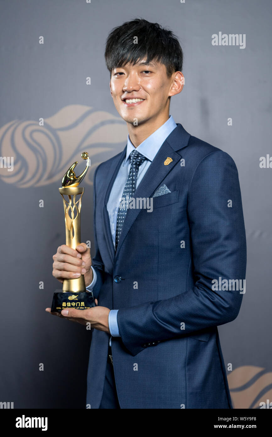 Chinese football player Yan Junling of Shanghai SIPG poses with his ...