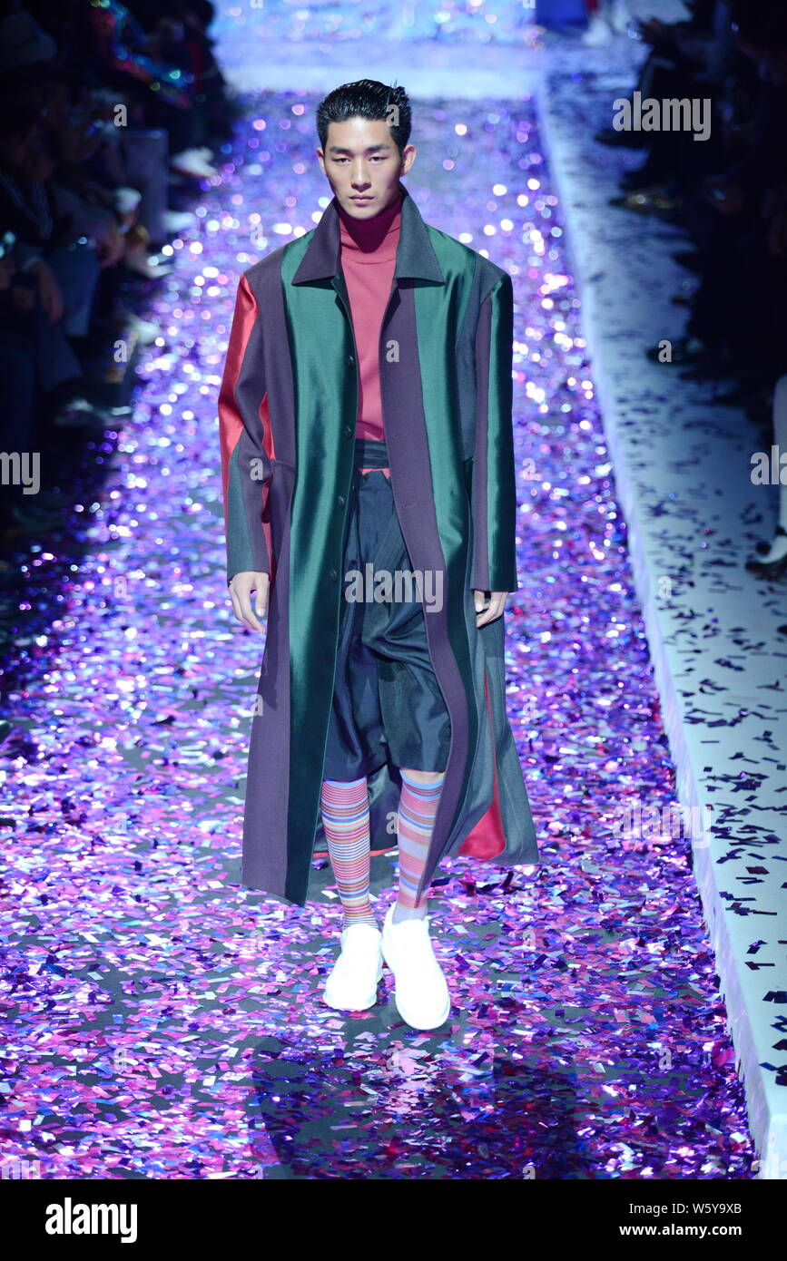 A model displays a new creation at the fashion show of Beautyberry by ...