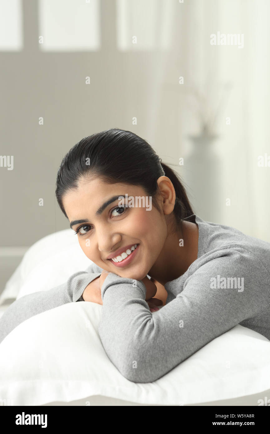 Photo beautiful smiling woman lying hi-res stock photography and images ...