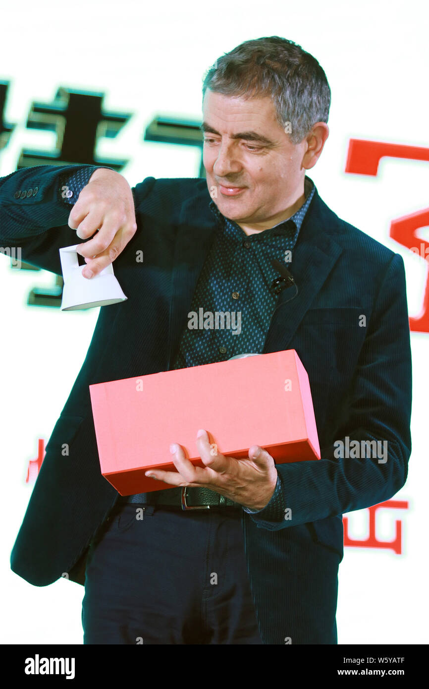 English actor Rowan Atkinson attends a press conference for his new ...