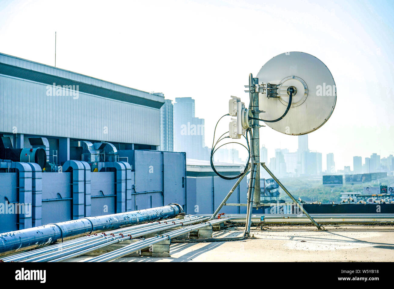 Industrial antenna at the building rooftop Stock Photo - Alamy