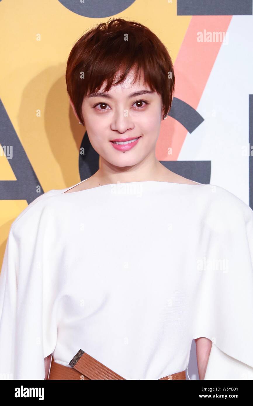 Chinese actress Sun Li poses as she attends the Louis Vuitton "Volez ...