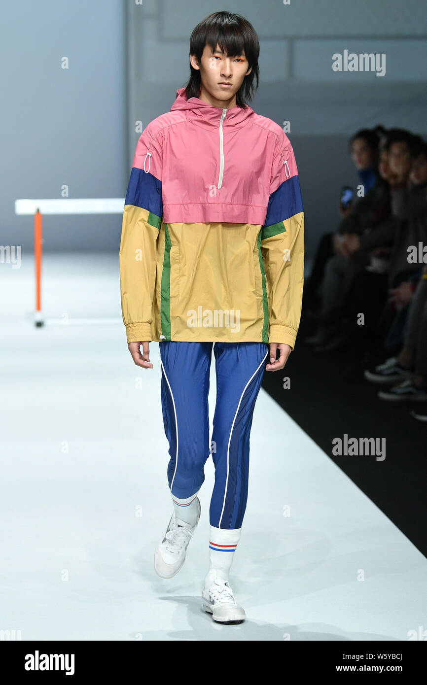 A model displays a new creation at the fashion show of SIVICO by Qiao ...