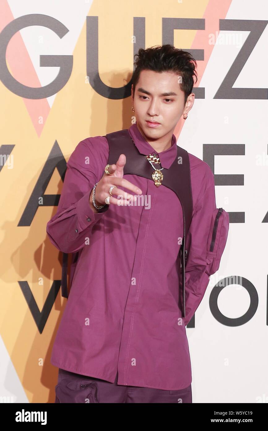 Chinese singer and actor Kris Wu or Wu Yifan arrives at the Louis ...