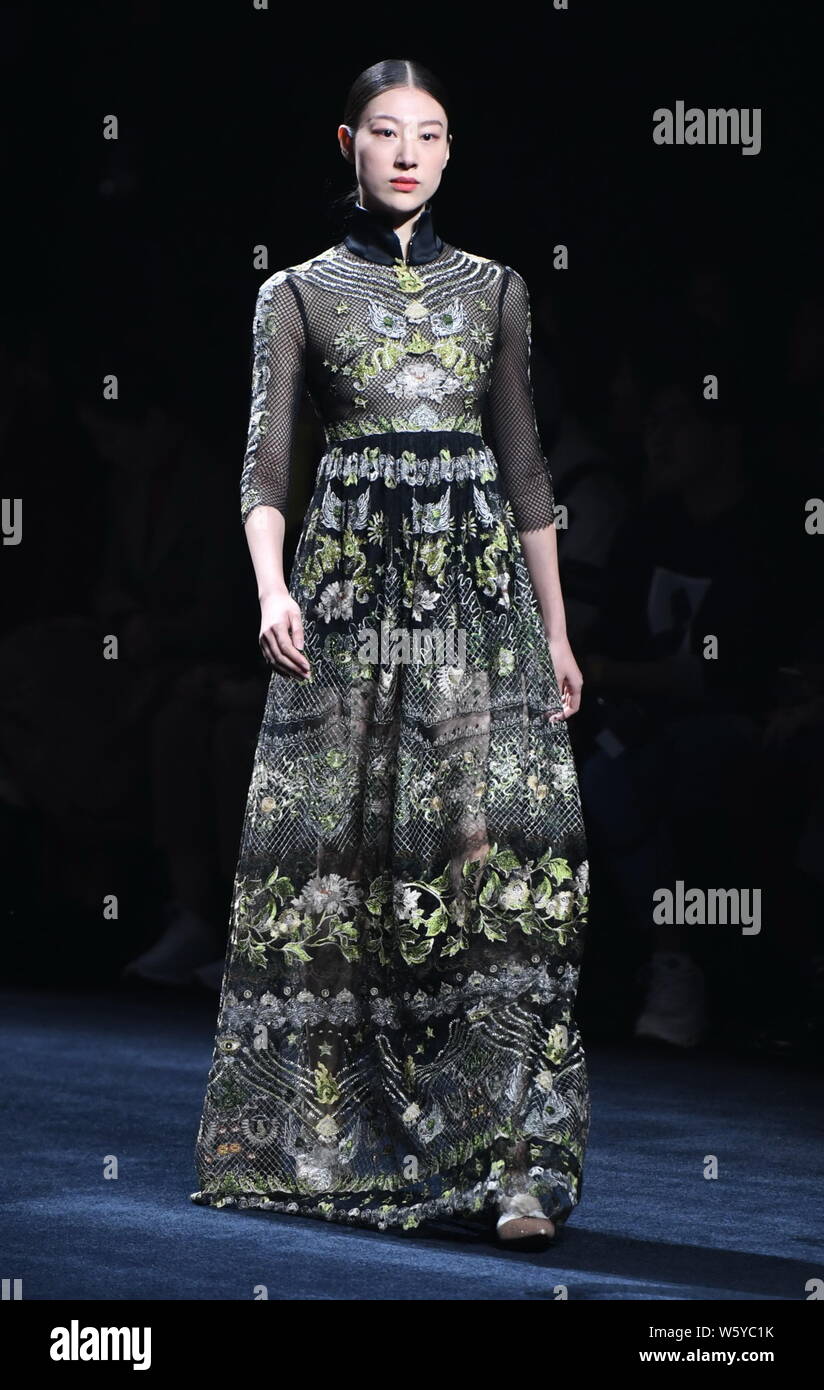 A model displays a new creation at the fashion show of EP YAYING during ...