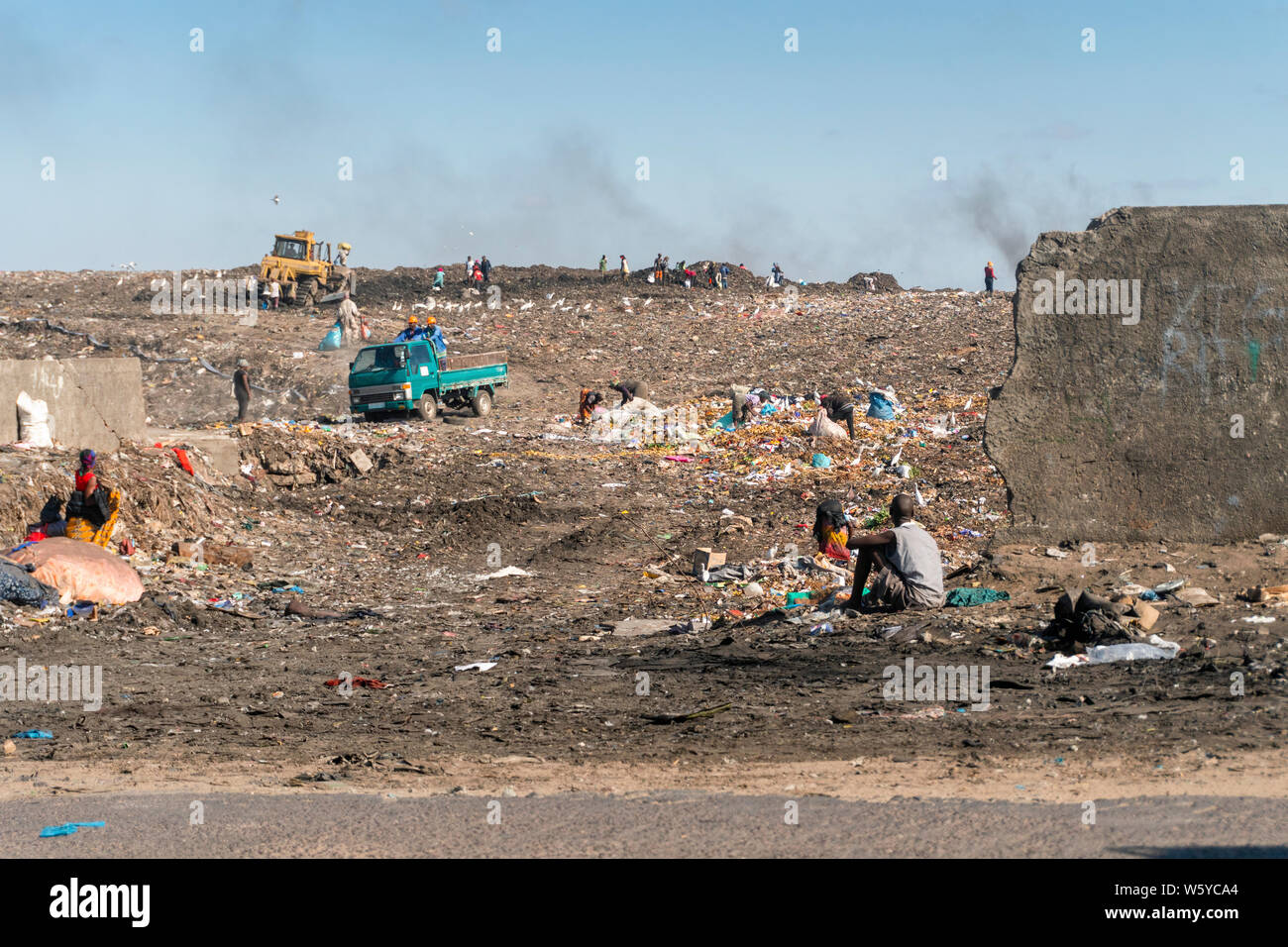 Garbage dump worker hi-res stock photography and images - Alamy