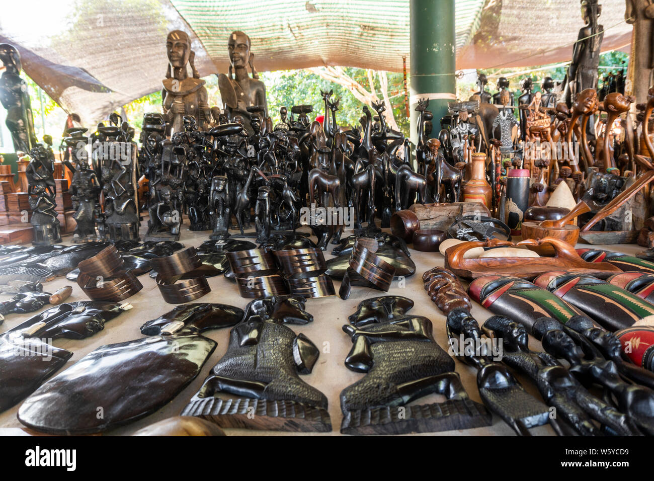African wooden art souvenir sold on open air market FEIMA in Maputo ...