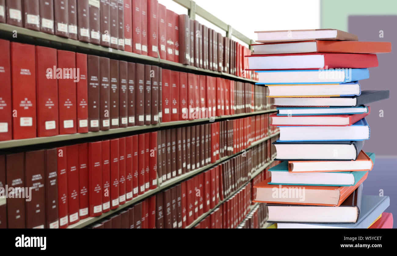 stack of books in library for education concept Stock Photo - Alamy