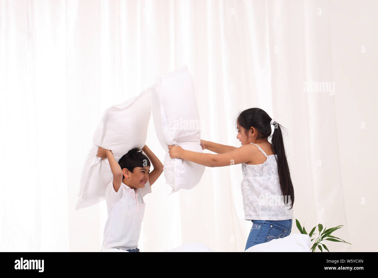 Brother sister play fighting on hi-res stock photography and images - Alamy