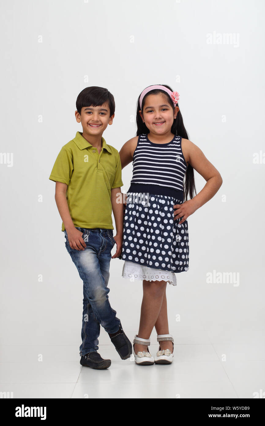 Portrait of two children smiling Stock Photo - Alamy