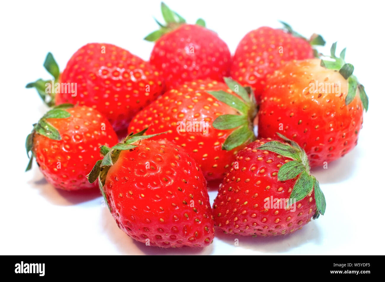 Strawberry berry slide isolated on white background Stock Photo - Alamy