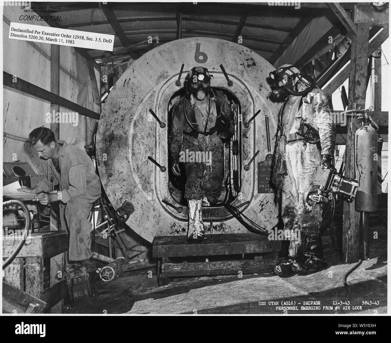 USS Utah (AG16)- Salvage 11-3-43, 5843-43; Personnel emerging from #6 ...