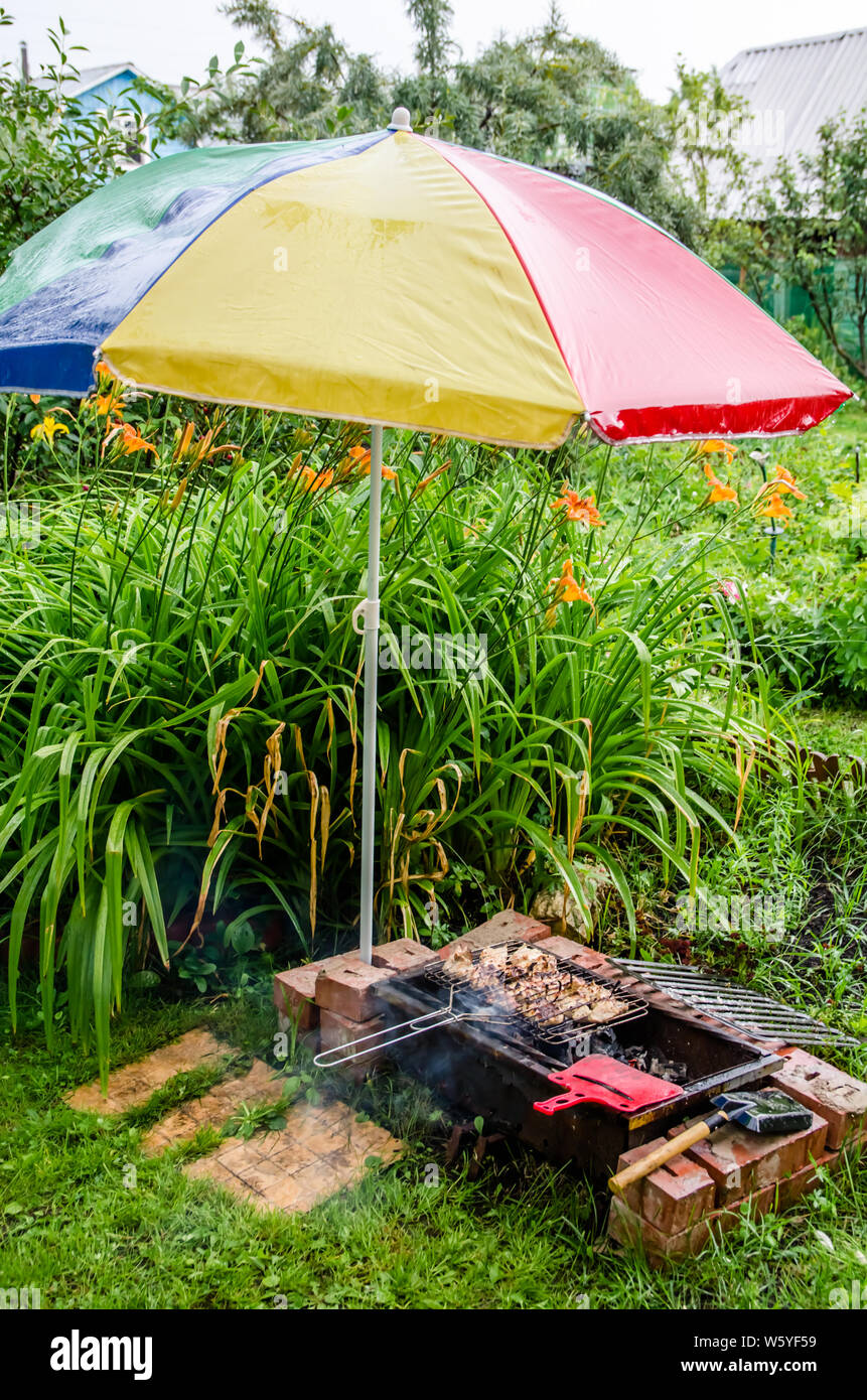 Summer bbq in the rain hi-res stock photography and images - Alamy