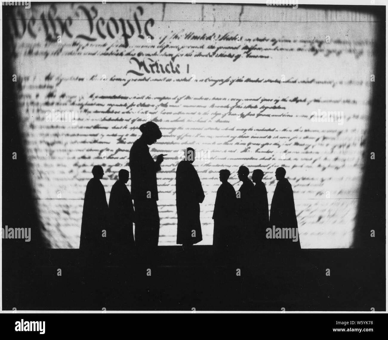 WPA:Federal Theater Project:figures silhouetted against backdrop of ...