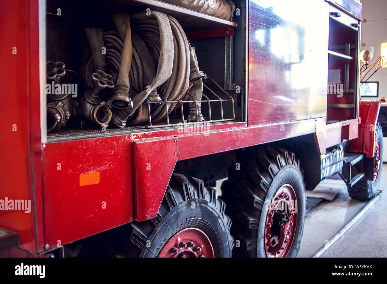 Fire truck engine with equipment in the fire department and ready for ...