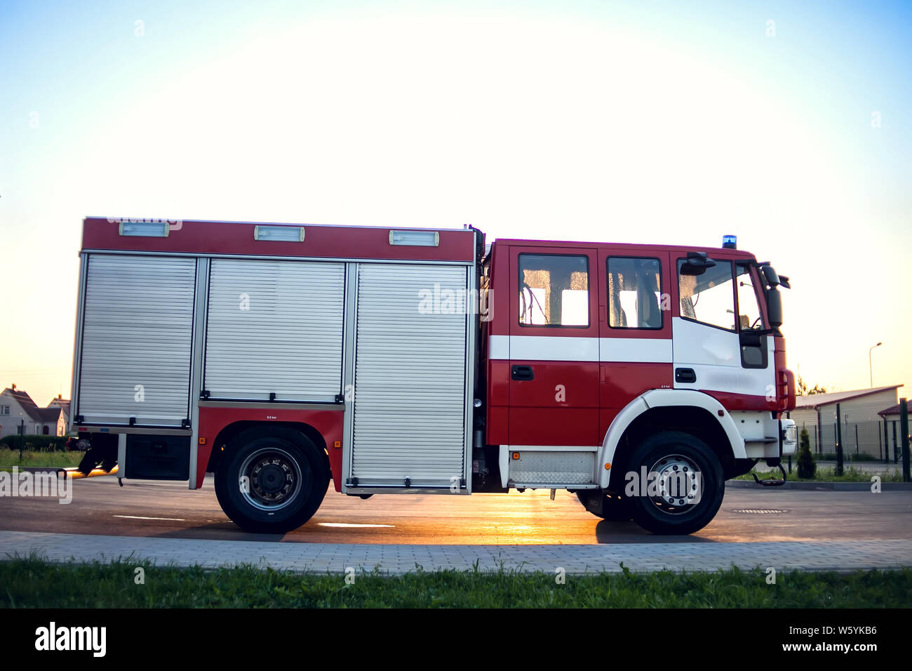 Fire truck engine with equipment in the fire department and ready for ...