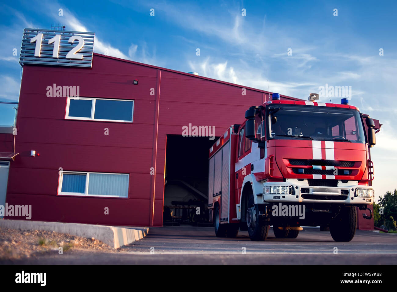 Fire truck engine with equipment in the fire department and ready for ...