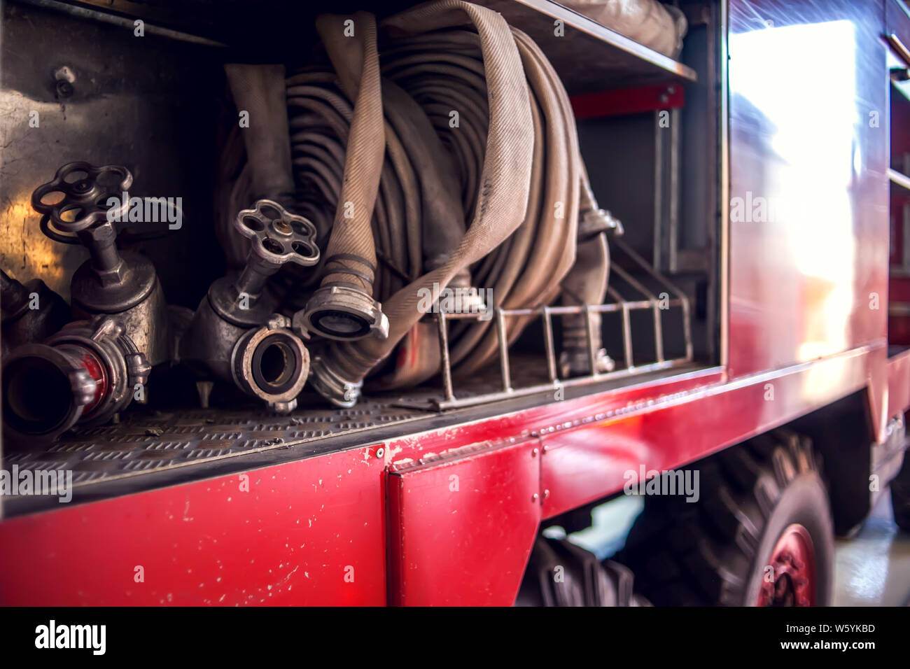 Fire truck engine with equipment in the fire department and ready for ...