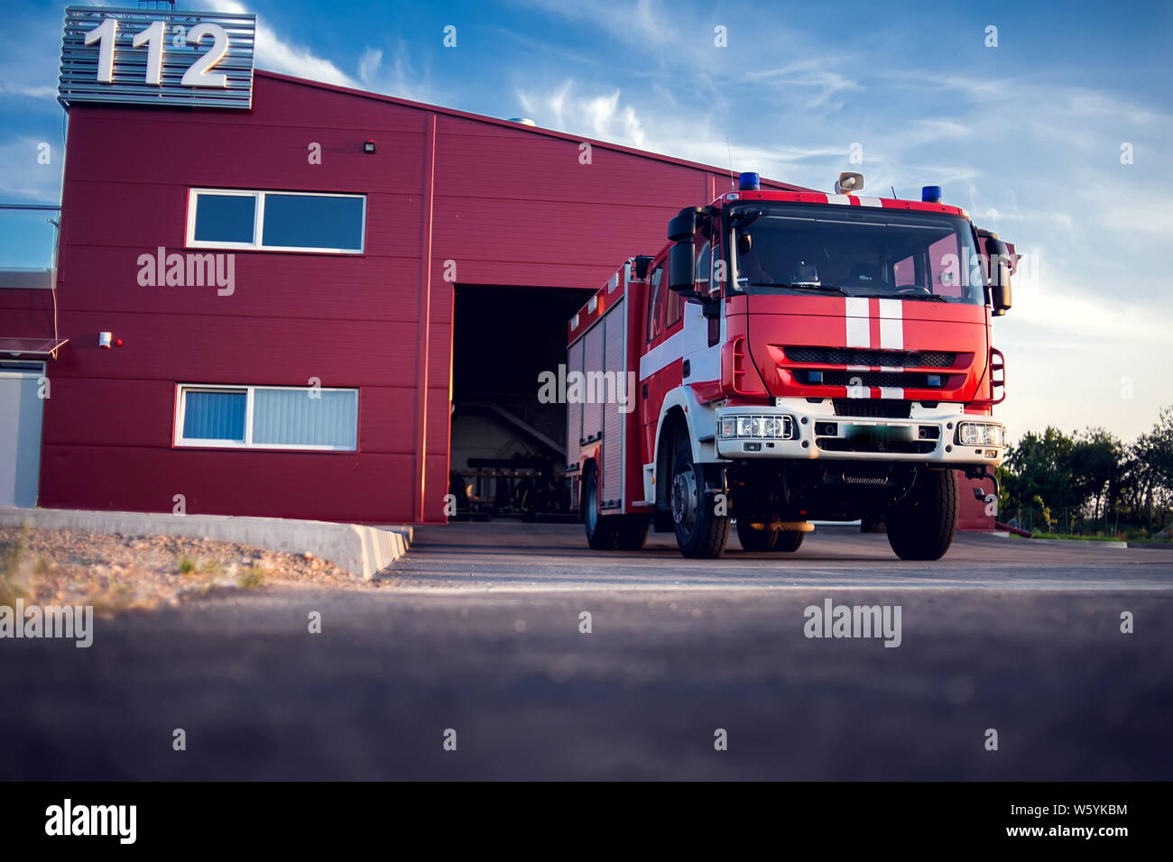 Fire truck engine with equipment in the fire department and ready for ...