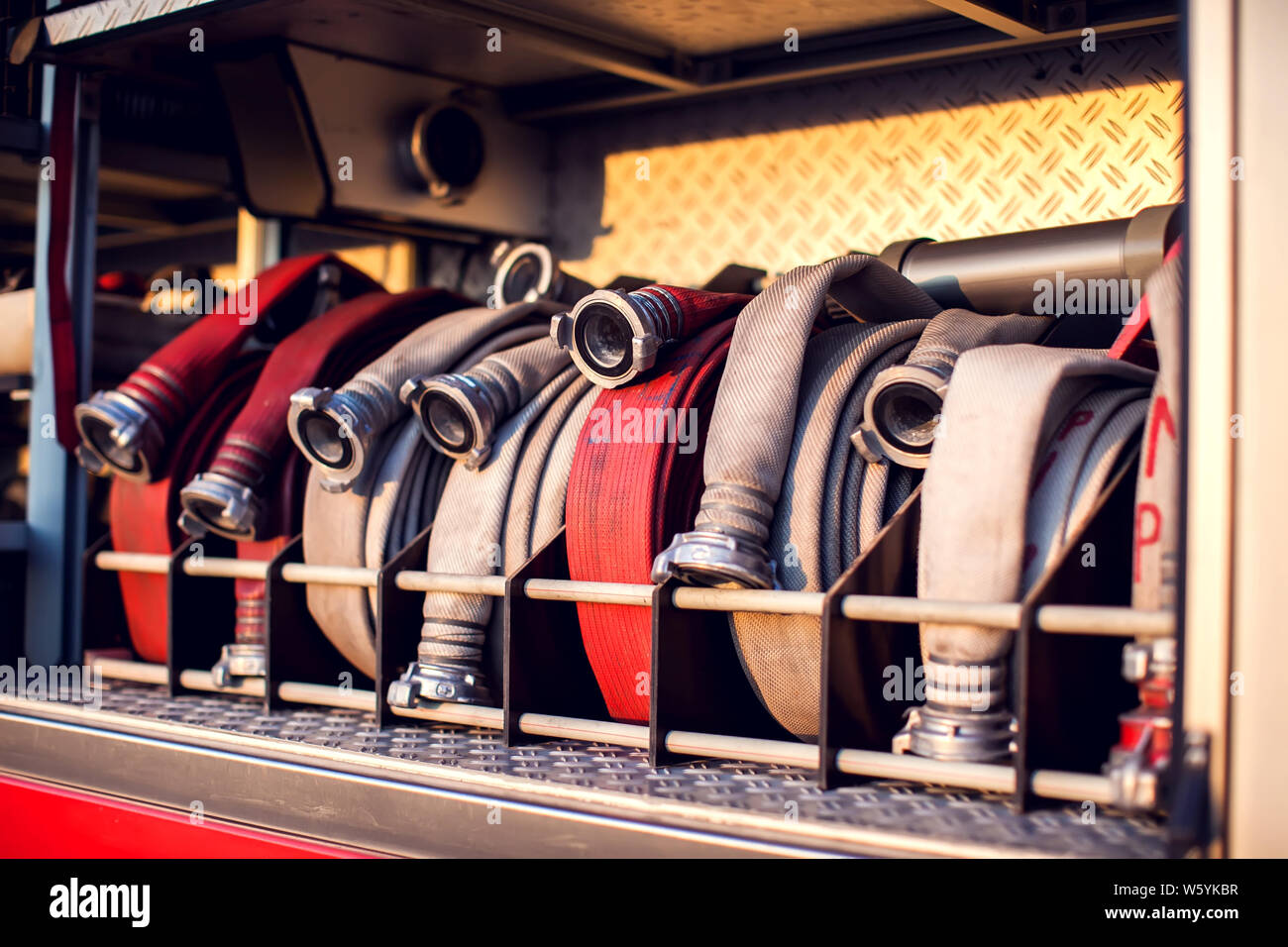 Fire truck engine with equipment in the fire department and ready for ...