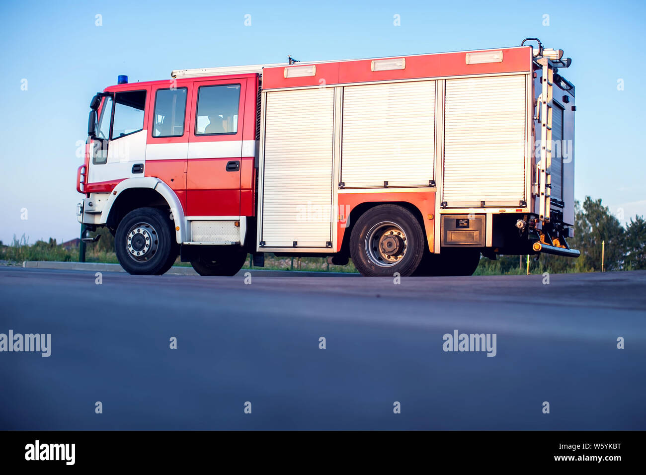 Fire truck engine with equipment in the fire department and ready for ...
