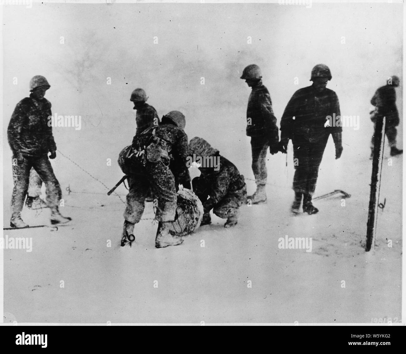 Stringing barbed wire hi-res stock photography and images - Alamy
