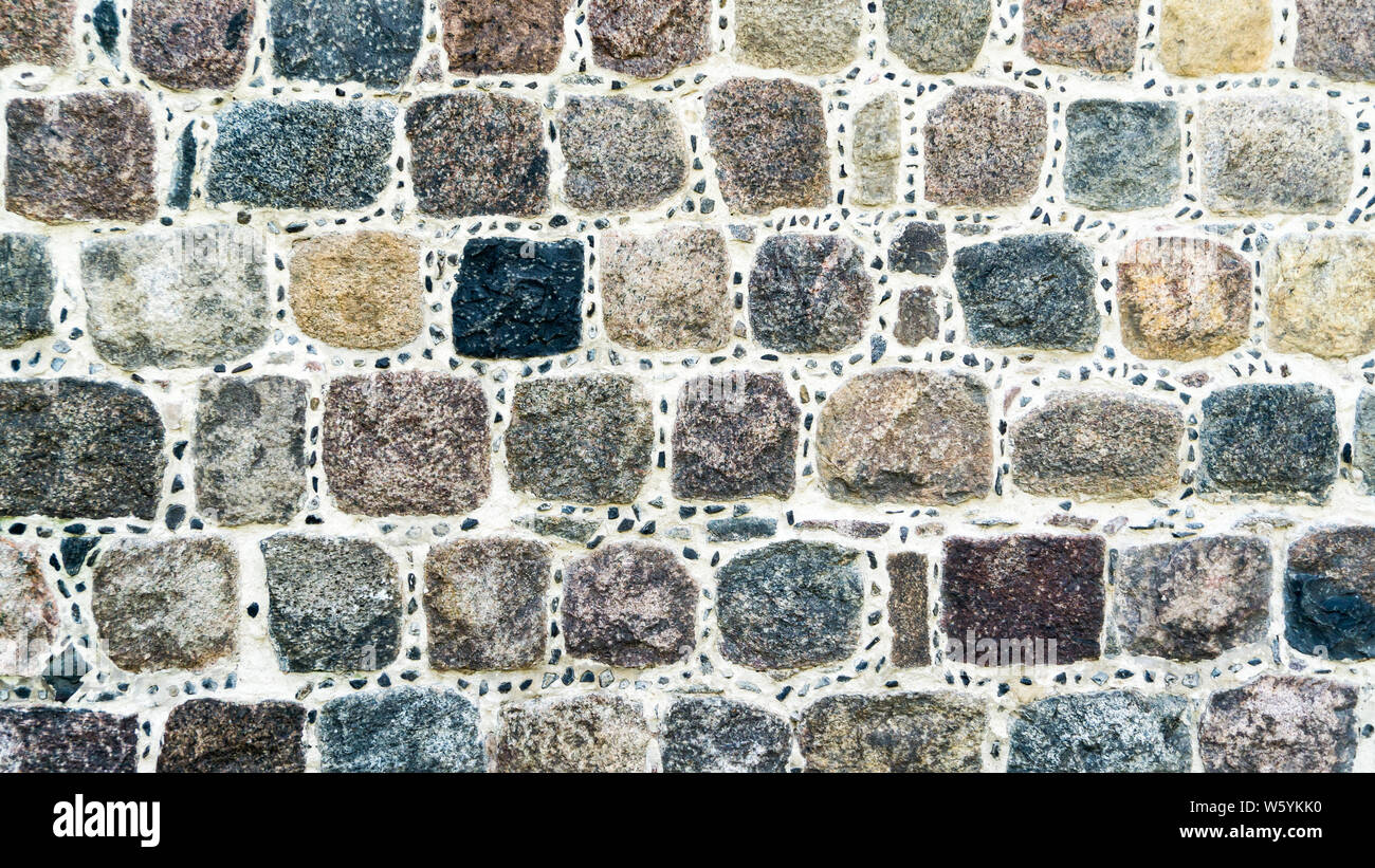 wall made of colorful cubic stones Stock Photo - Alamy