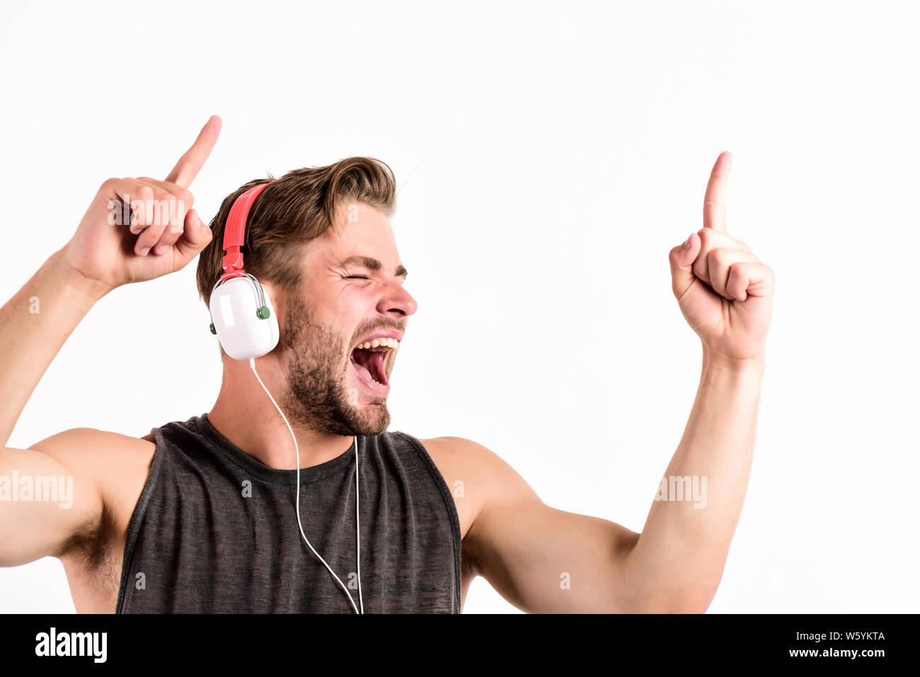 Start this party. Man handsome dj using modern headphones. Professional ...