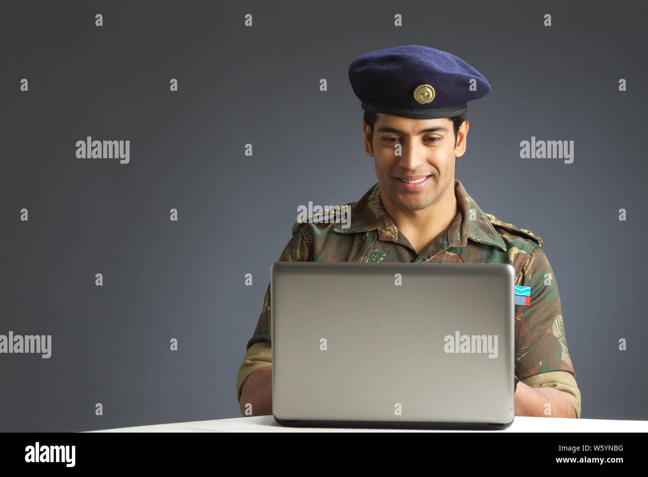 Army Soldier working on a laptop Stock Photo - Alamy