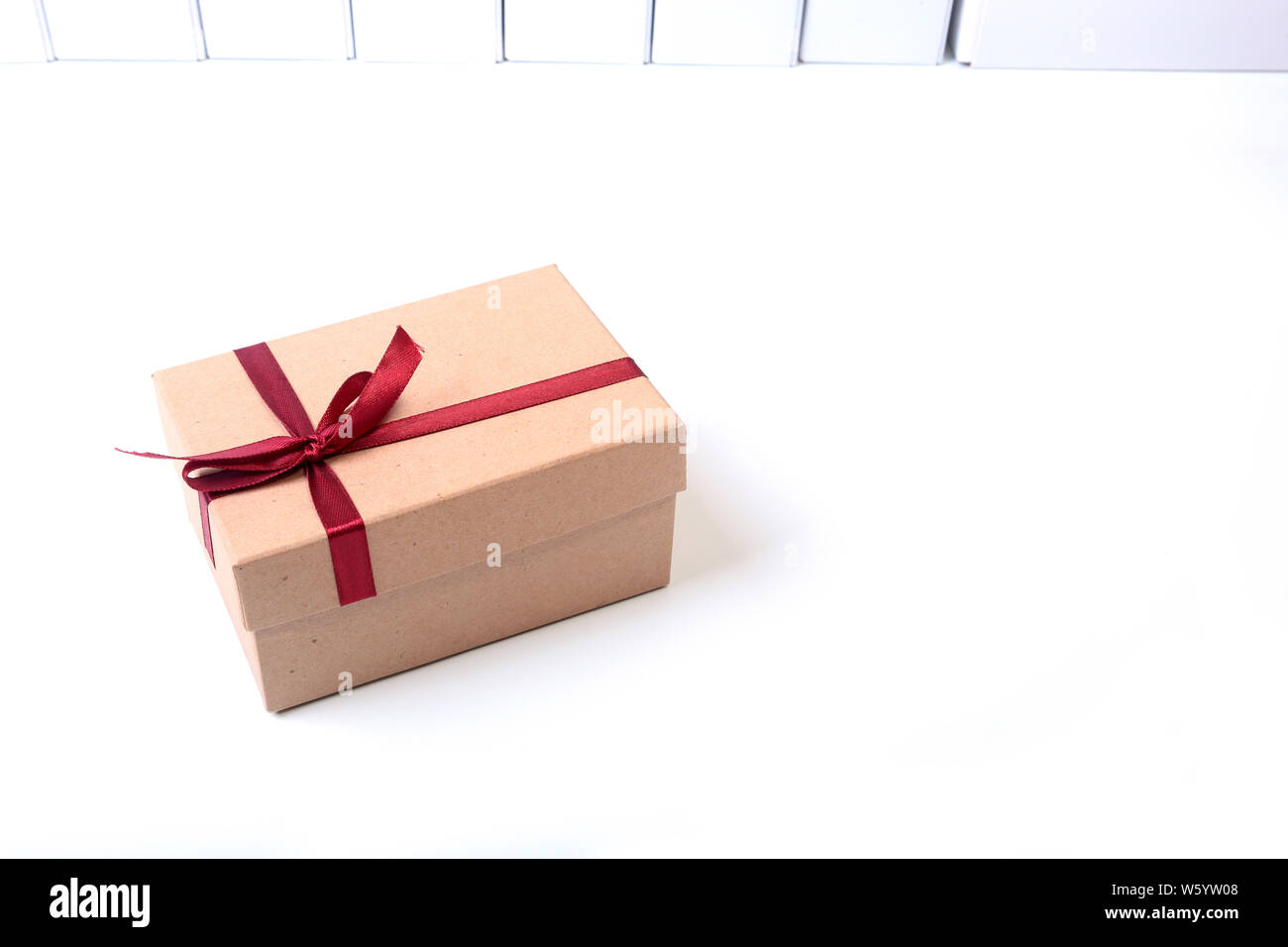 Gift boxes with bow on white background Stock Photo - Alamy